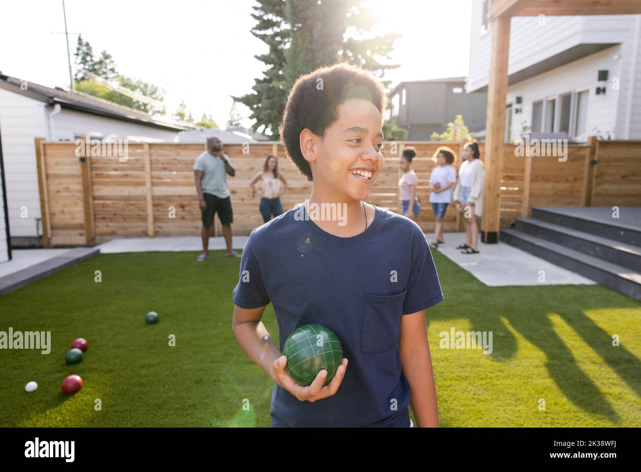 Playing bocce ball on grass hi-res stock photography and images - Alamy