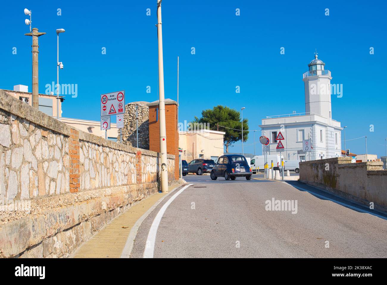 A vintage car on a street at the port of Manfredonia, Foggia, Italy ...