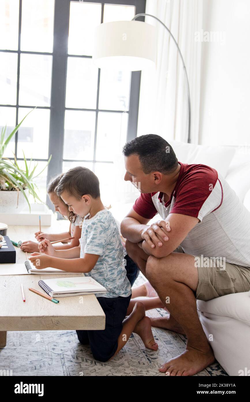 Daughter son watching hi-res stock photography and images - Alamy