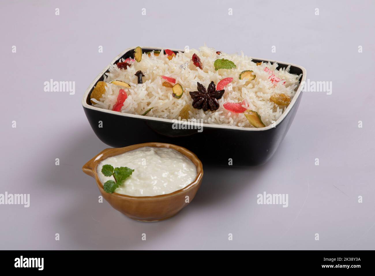 Star anise placed on cooked rice with use of selective focus on a ...