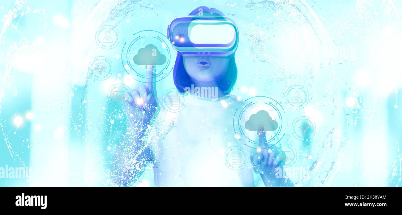 Potrait of asian woman in virtual reality glasses, pointing, choosing ...