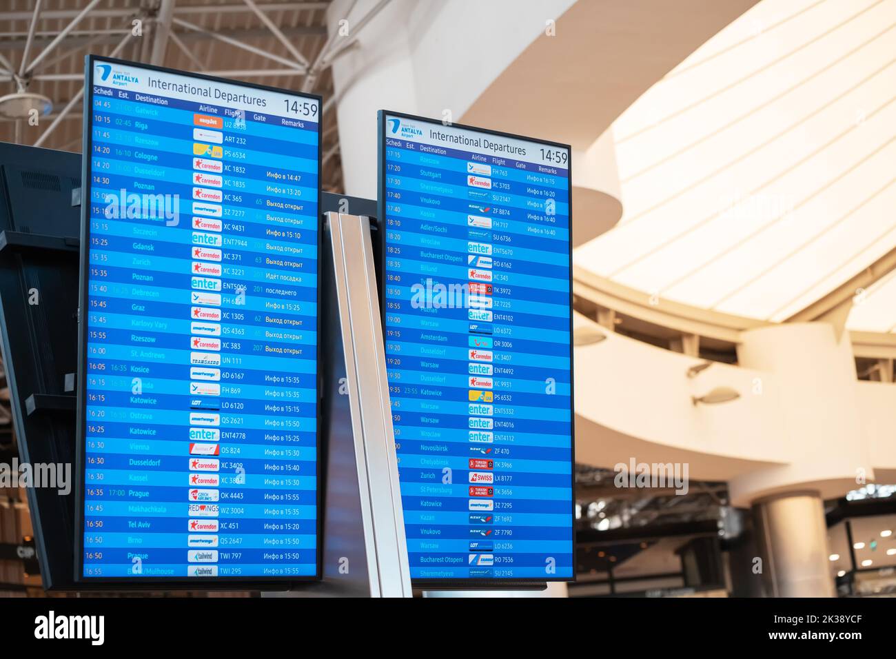 20 July 2022, Antalya, Turkey: Timetables with flights info in airport ...