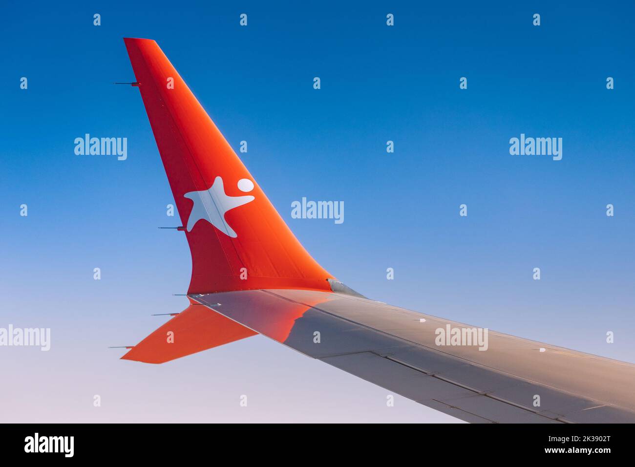 20 July 2022, Antalya, Turkey: Corendon airline logo on a winglet ...