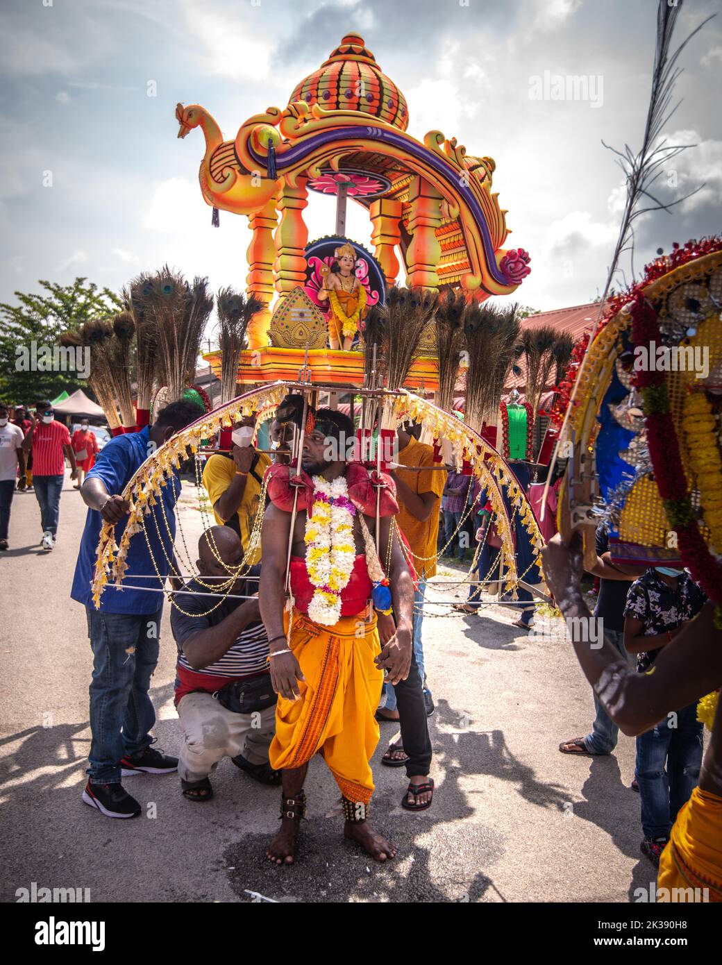 A Hindu devotee seen with sharp self piercing on body as ceremonial act ...