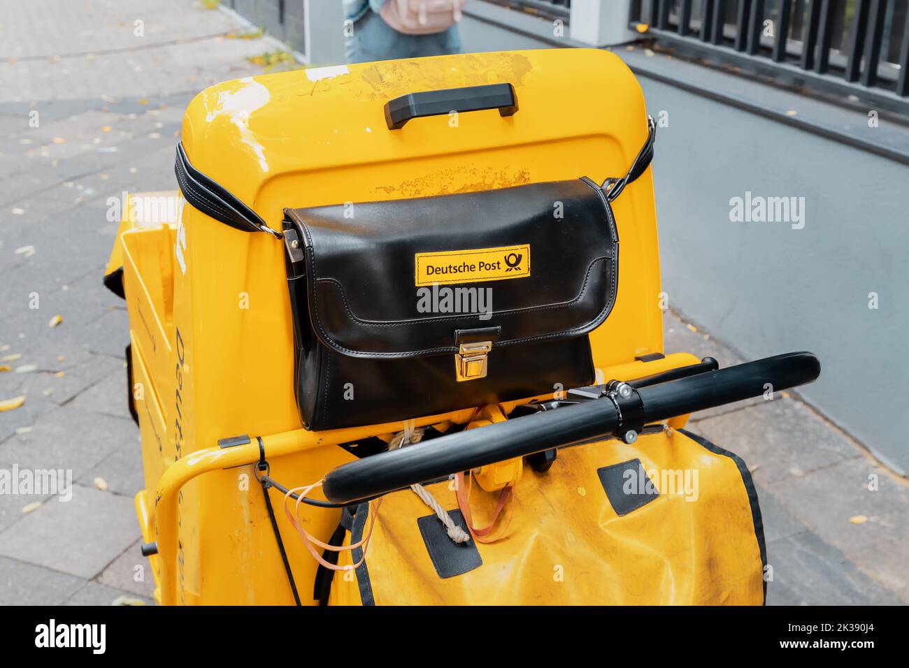 21 July 2022, Dusseldorf, Germany: Deutsche Post mail delivery yellow ...