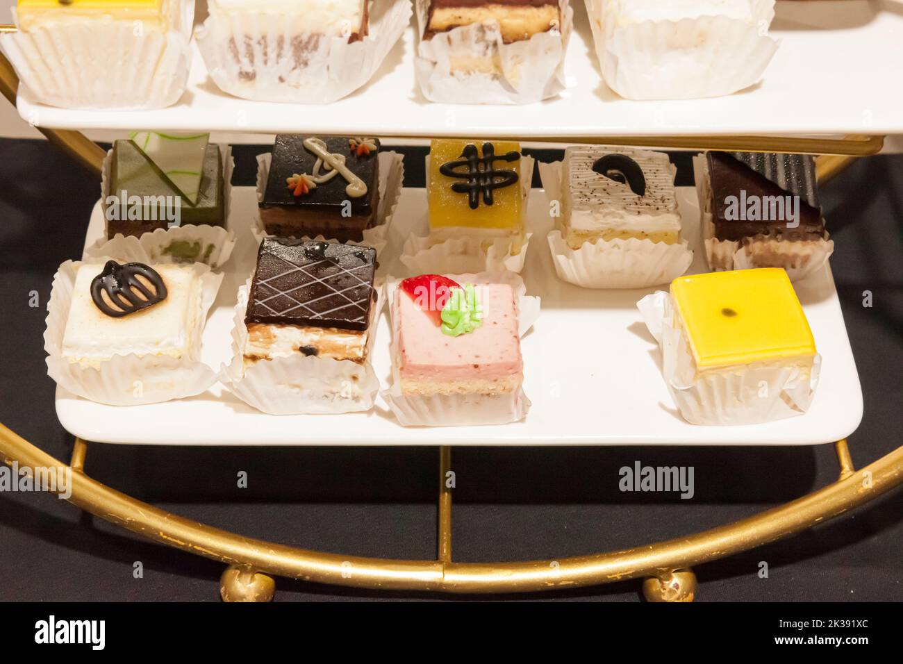 group of slice small cake display case in the store for sale Stock ...