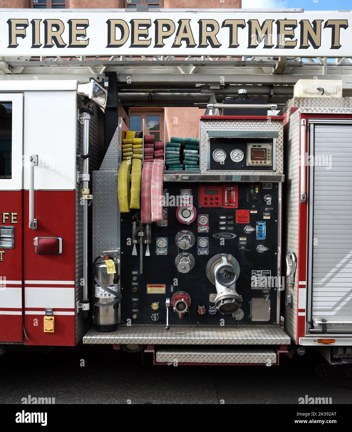 The control panel on the side of a U.S. fire truck with various valves ...
