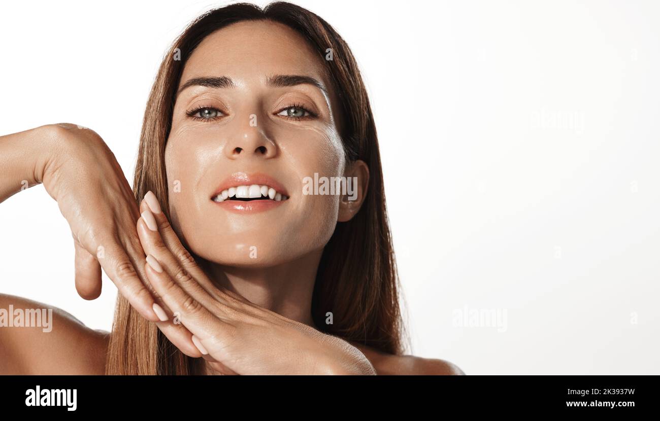 Beauty and skin care. Smiling woman 30 years old with glowing ...