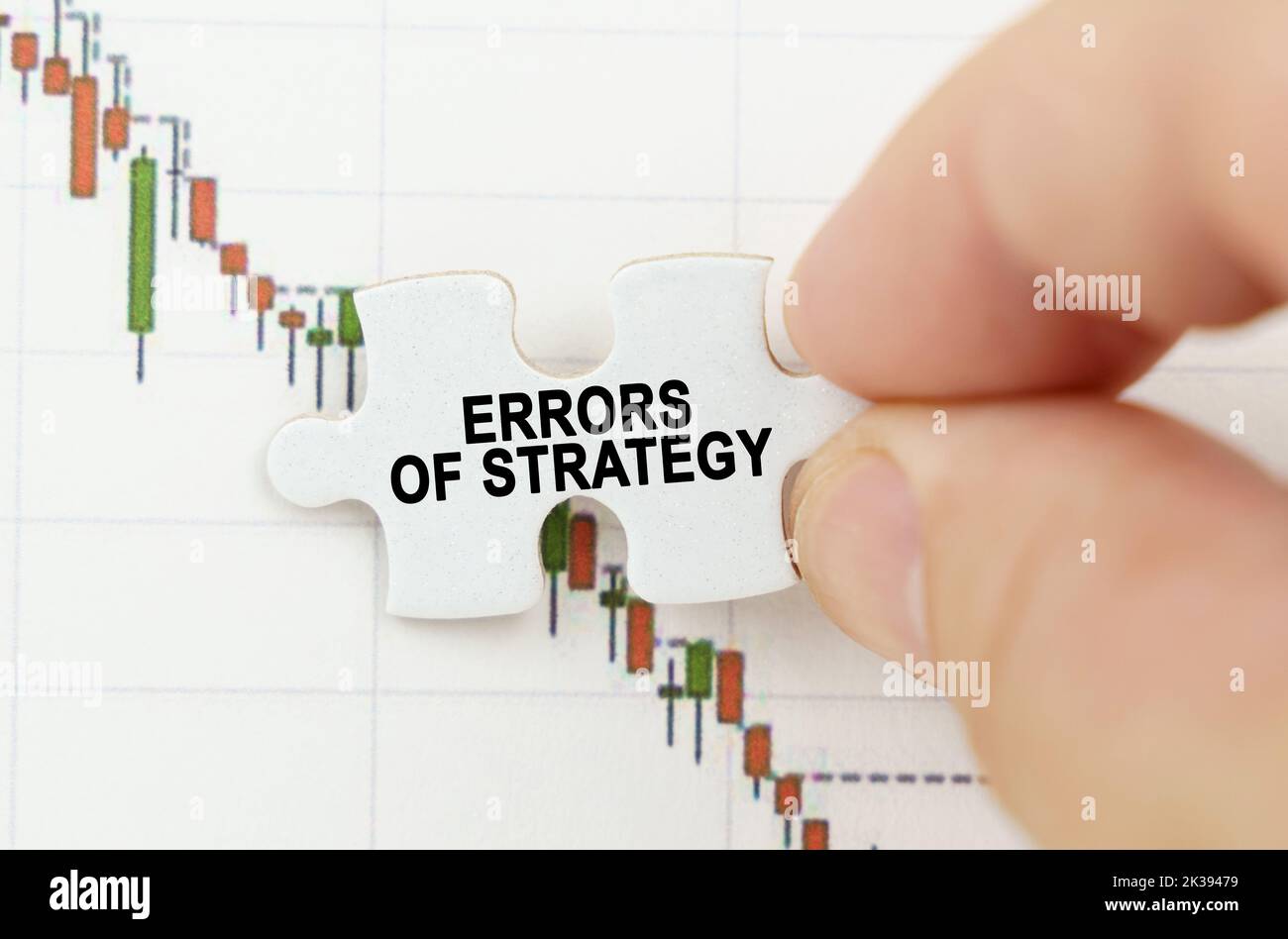 Business concept. Against the background of the quotes chart, a puzzle ...