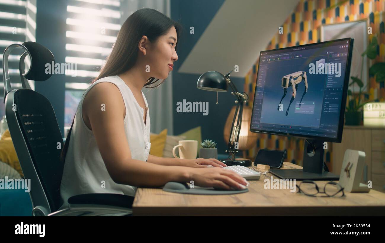 Asian Woman Working On Pc In 3d Modeling Program Remotely From Home 2000