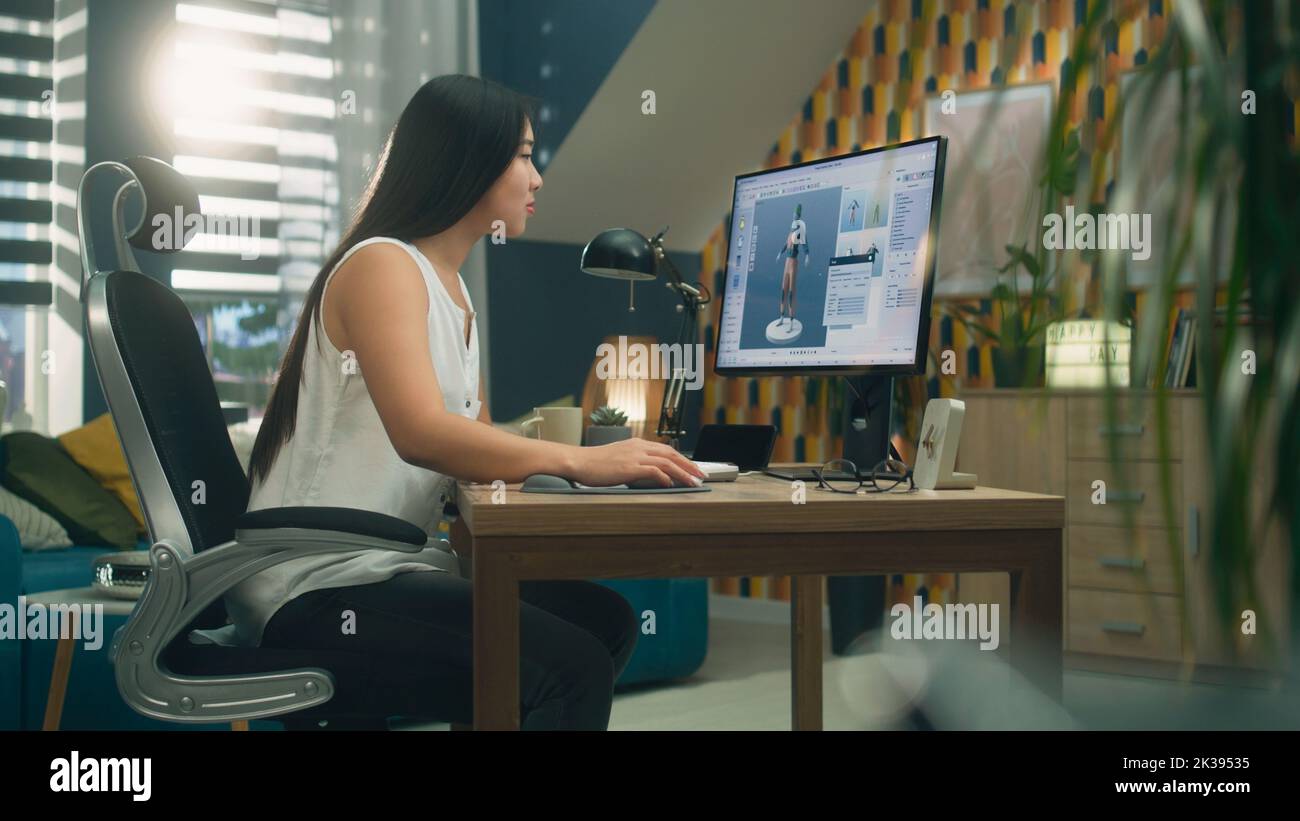 Asian 3D designer creating 3D model of style and design of clothes in ...