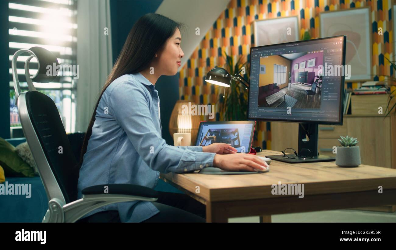 Female asian designer working remotely from home office and making 3D ...