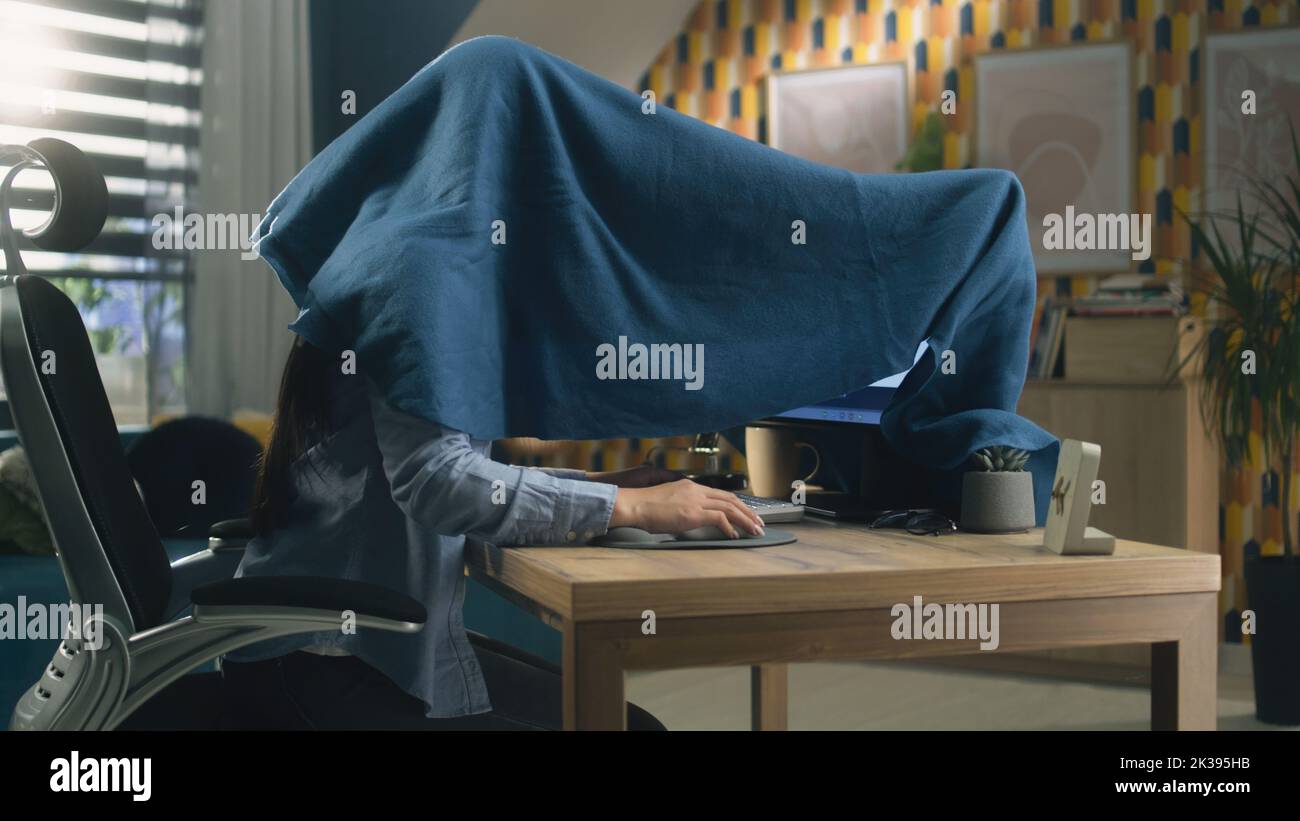 Hiding under desk hi-res stock photography and images - Alamy