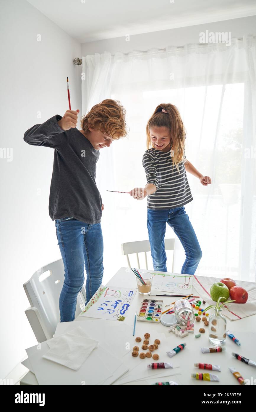 Brother sister fight table hi-res stock photography and images - Alamy