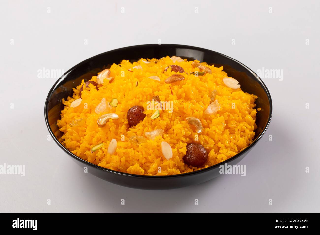 Bangladesh Sweets Jorda Polau isolated on white background Stock Photo ...