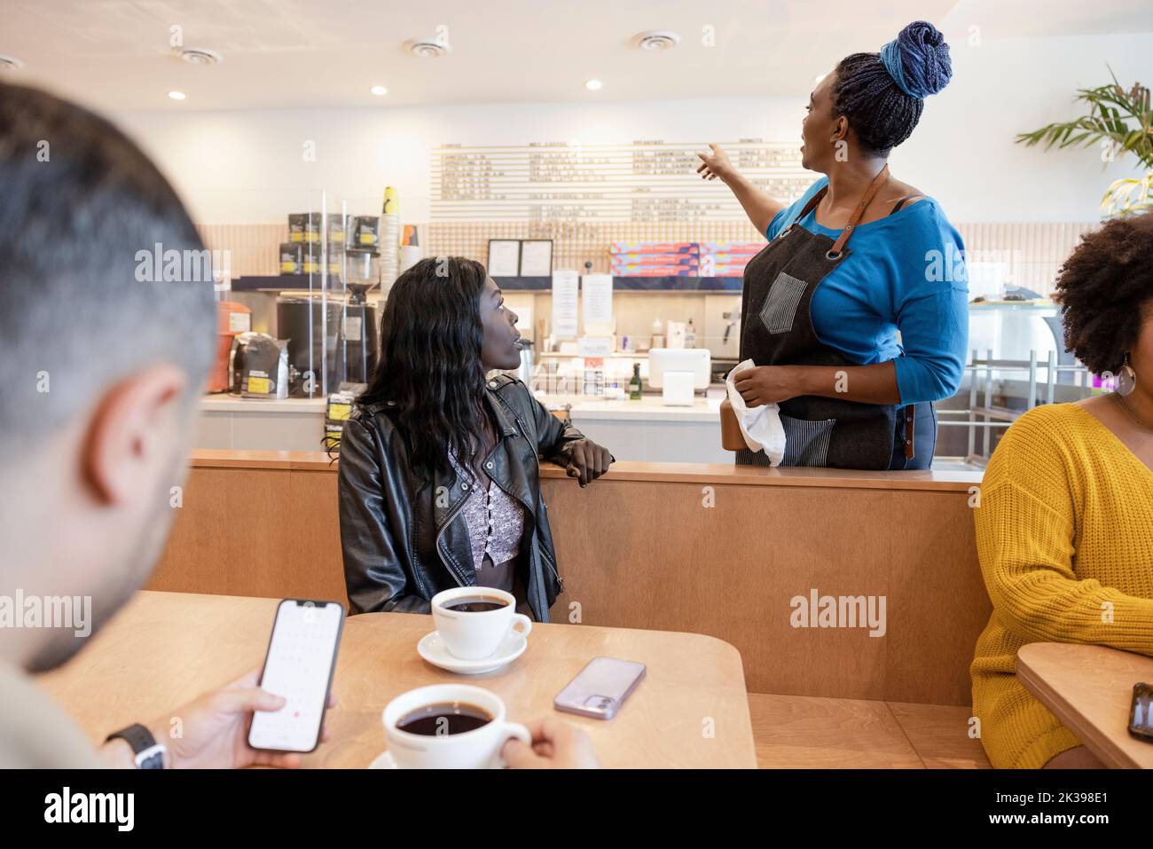 Back business woman pointing in hi-res stock photography and images - Alamy