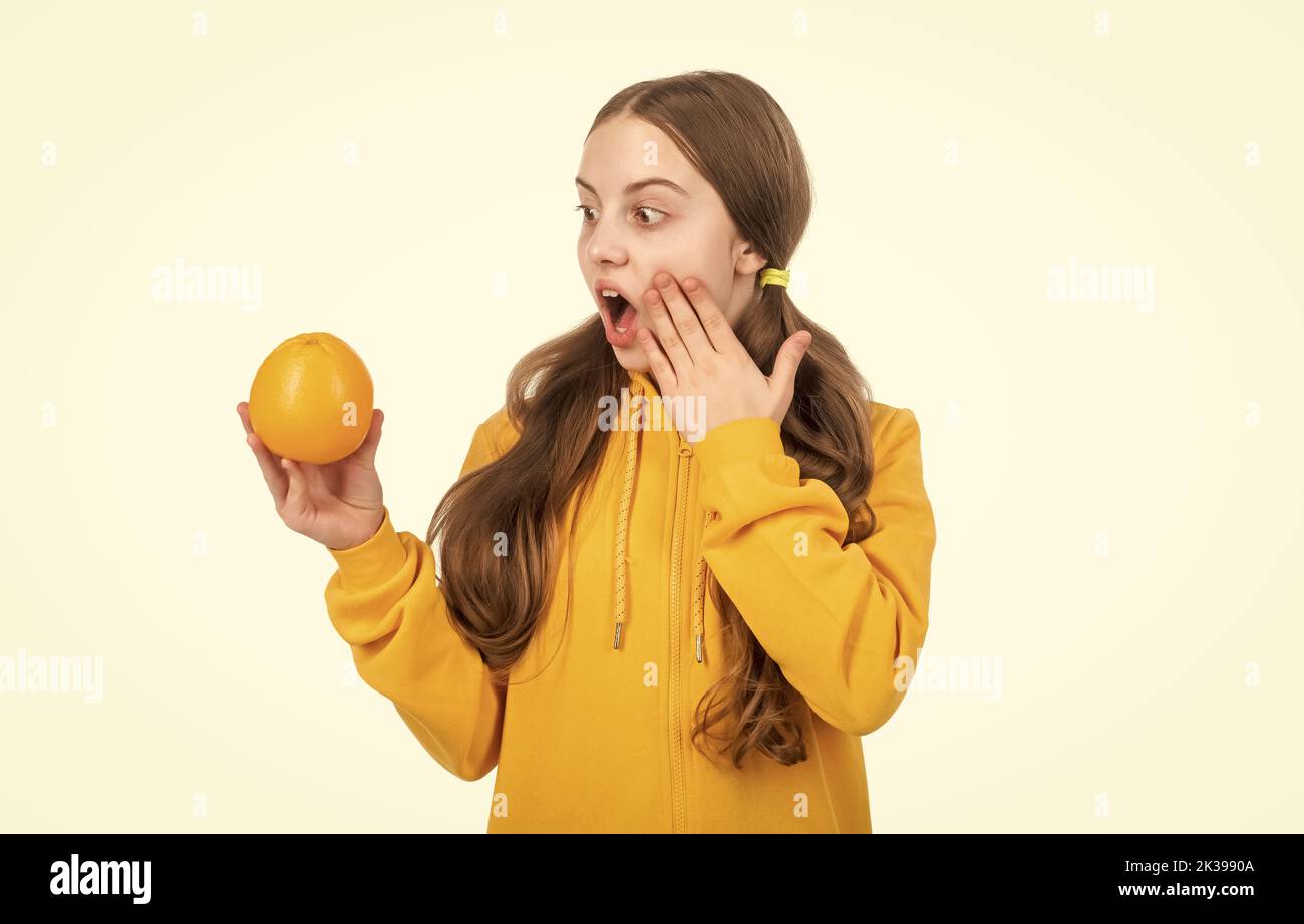 child eating healthy food. childhood health. citrus fruits. natural ...