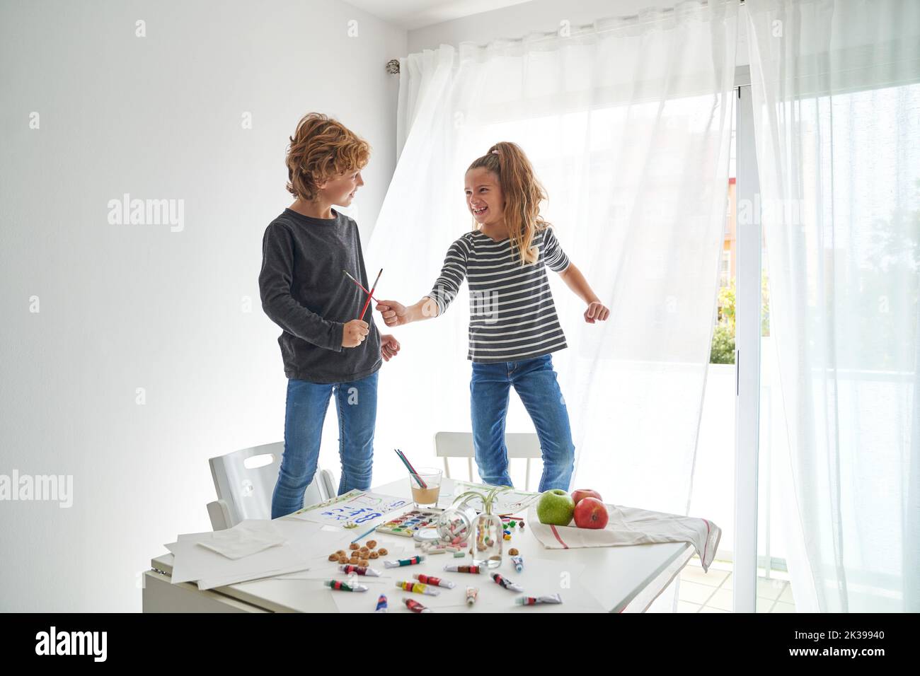 Brother sister fight table hi-res stock photography and images - Alamy