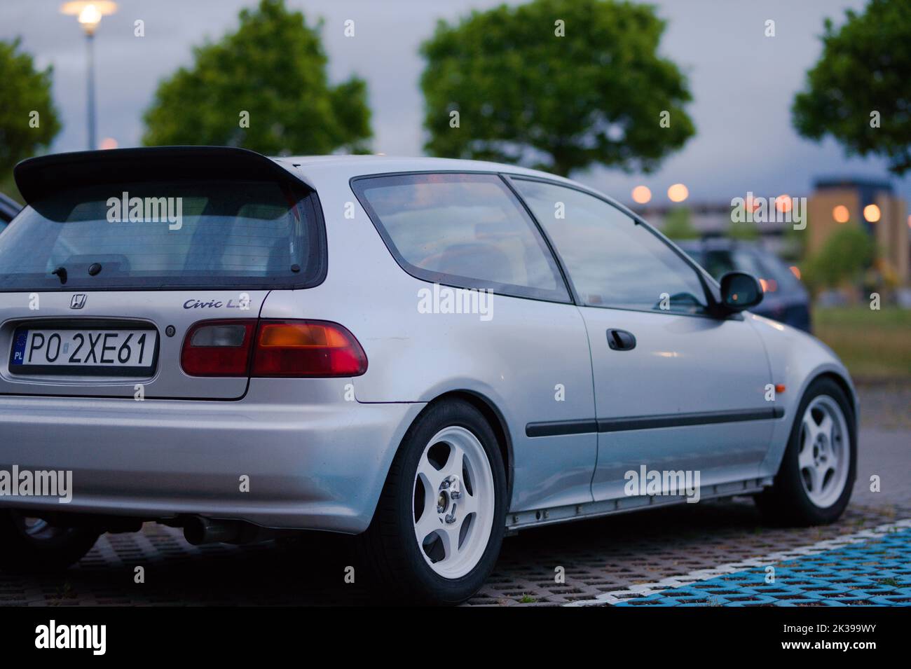 A closeup shot of the Honda Civic EG LSi with Spoon spoiler parked ...