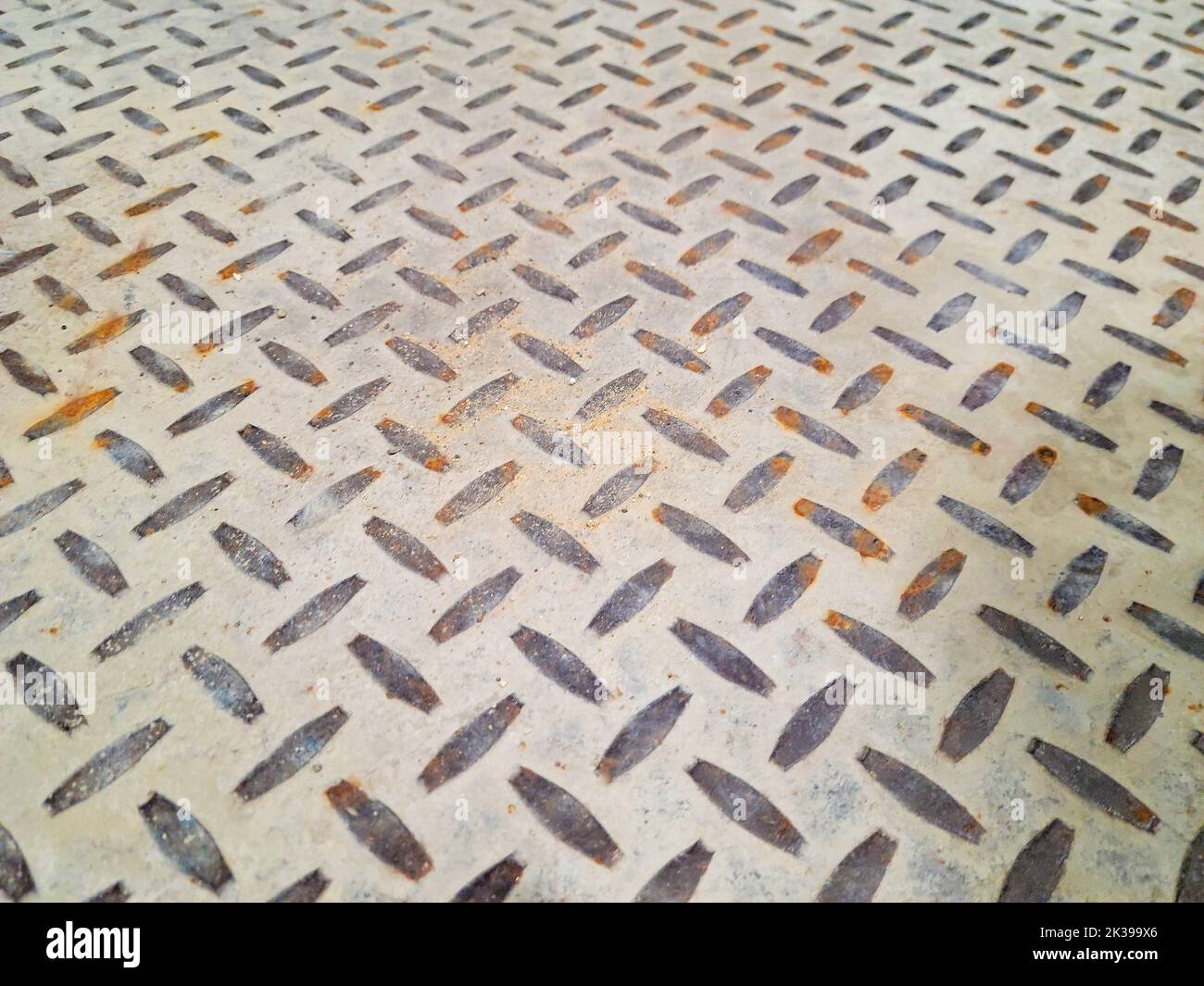 Rusty diamond plate pattern background Stock Photo - Alamy
