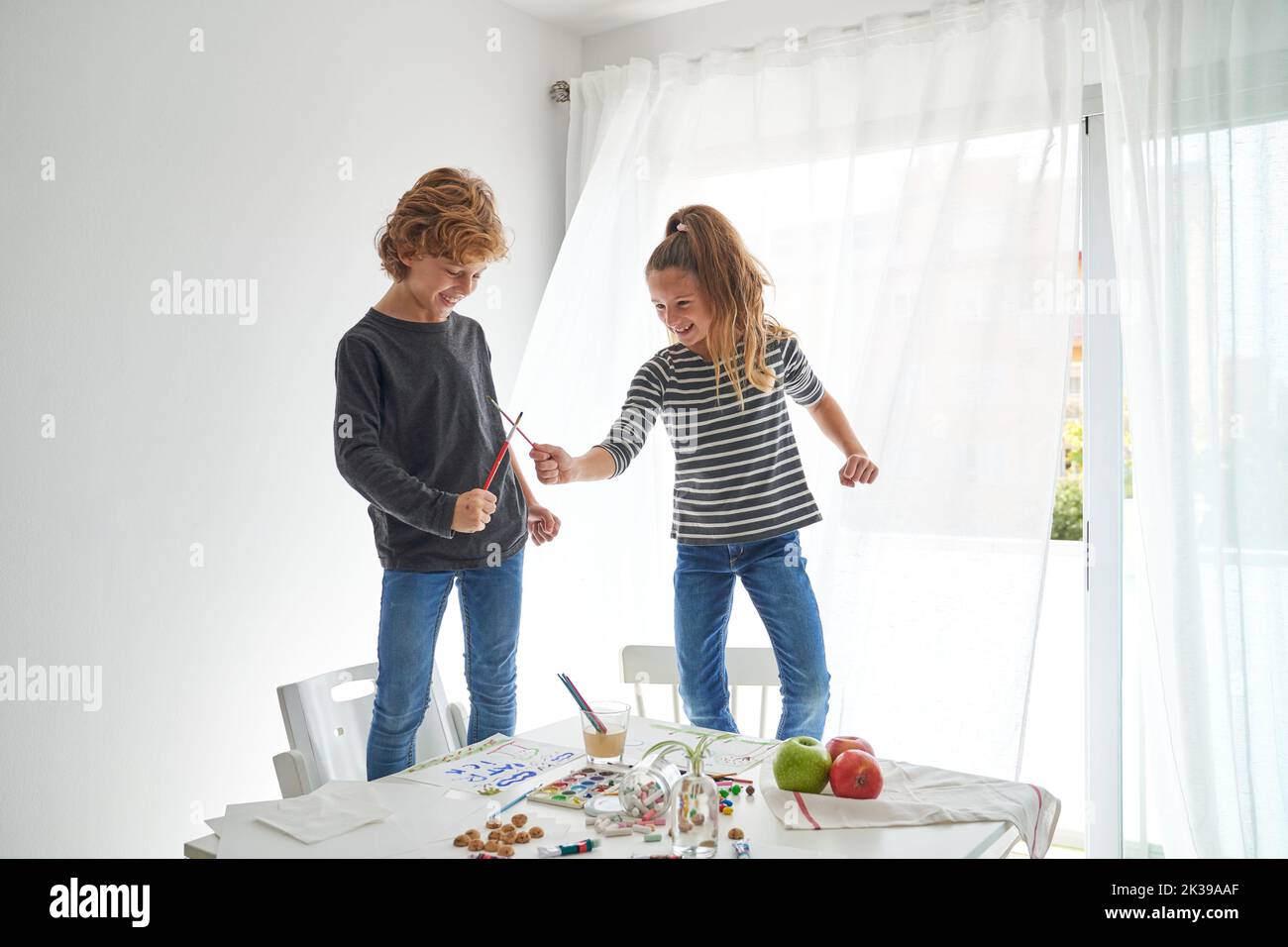 Brother sister fight table hi-res stock photography and images - Alamy