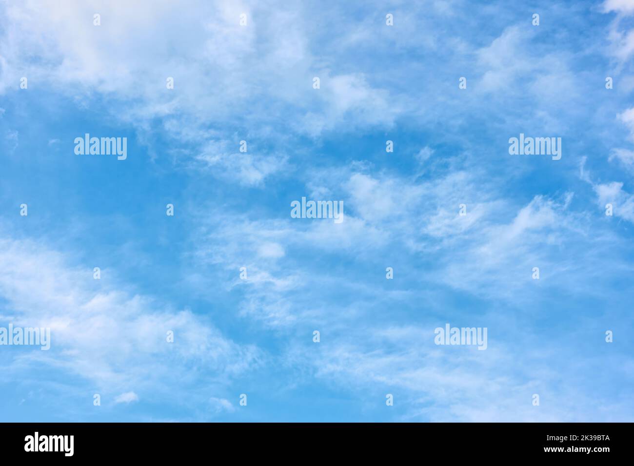 Blue sky with diffused clouds - background with copy space Stock Photo ...