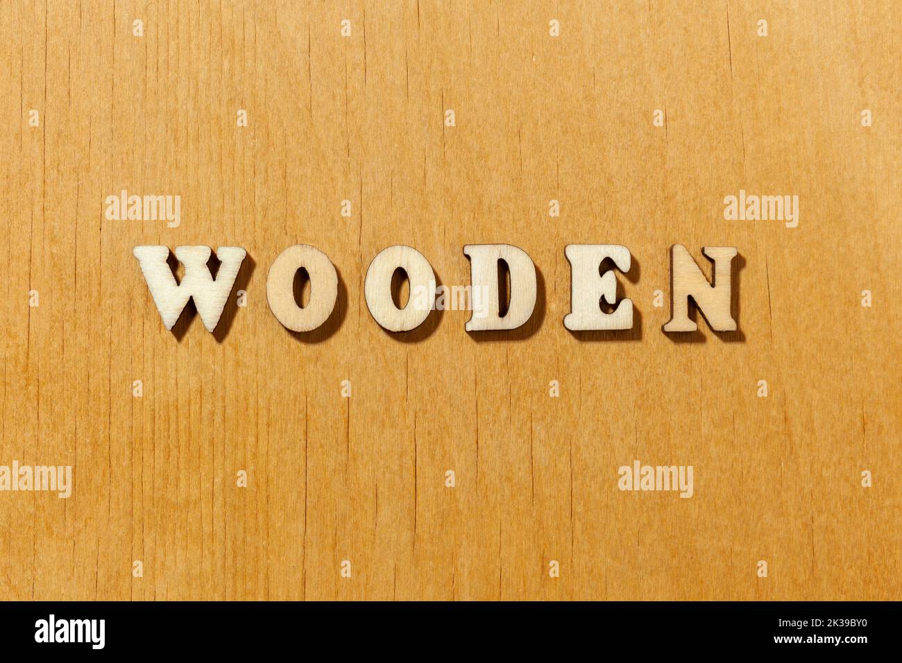 'Wooden' word - Inscription by wood letters close up Stock Photo - Alamy