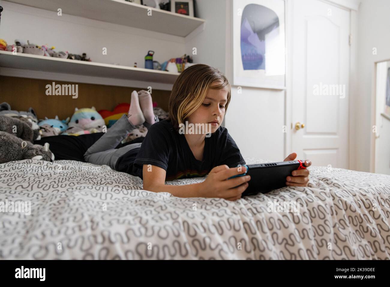Boy game bed hi-res stock photography and images - Alamy
