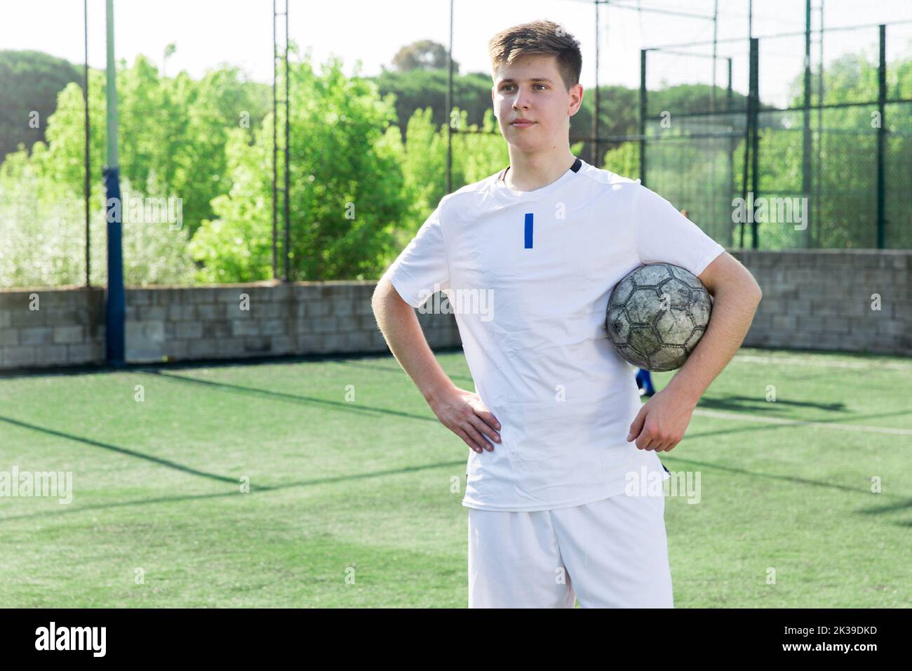 Portrait of teen boy soccer player on field Stock Photo - Alamy