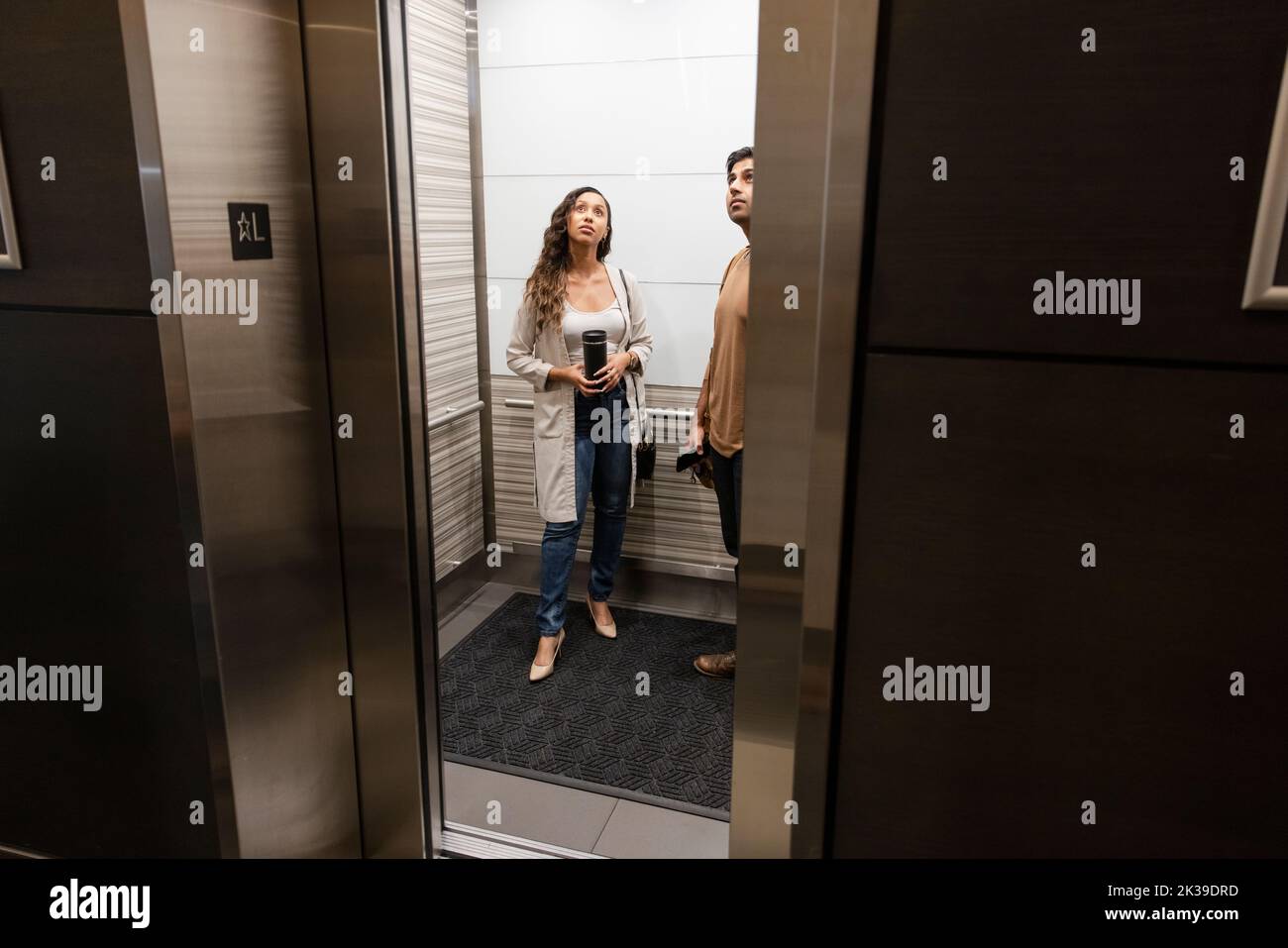 People Standing In Elevator