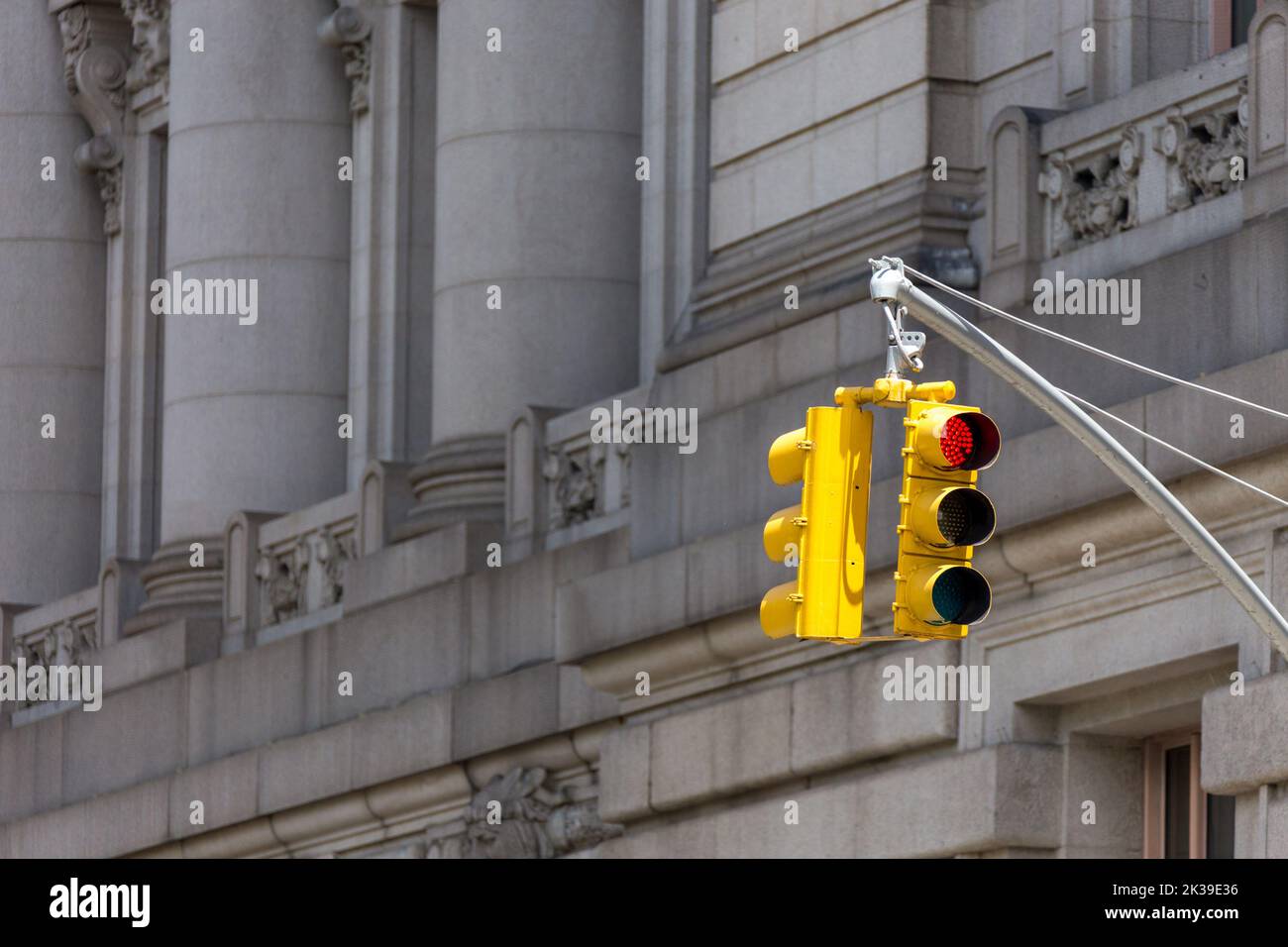 Yellow traffic lights on a street in New York city Stock Photo - Alamy