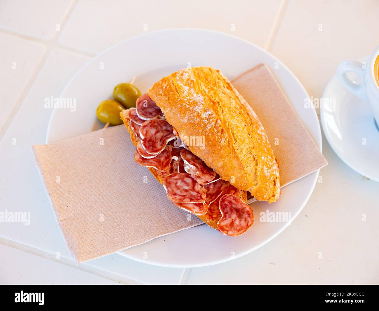 Sandwich with delicious delicaty dried sausage Fuet Stock Photo - Alamy