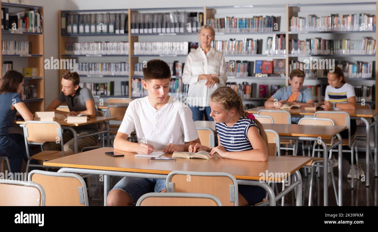 Students working in pairs Stock Photo - Alamy
