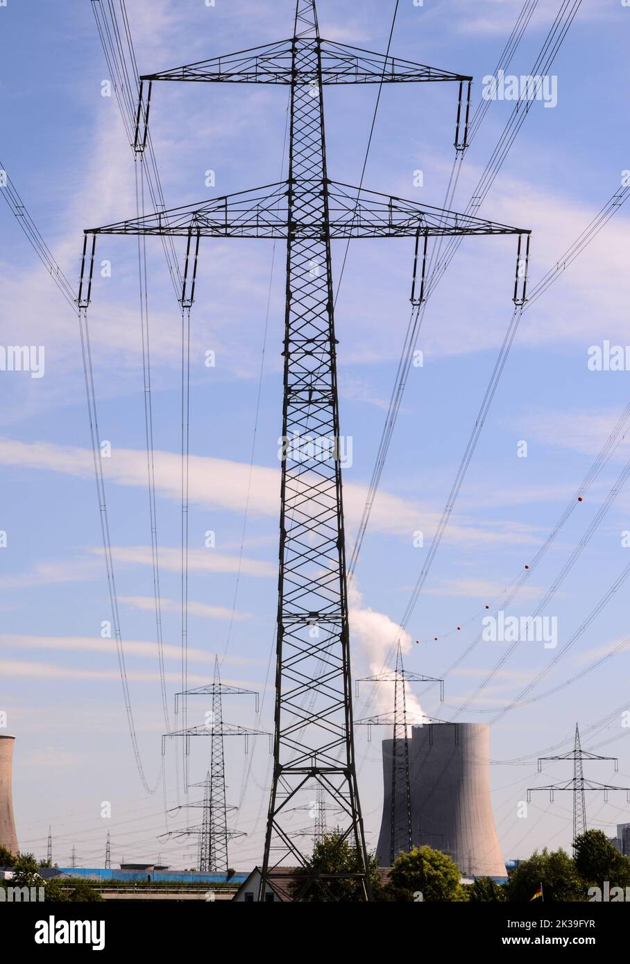 A vertical shot of a high voltage electric transmission tower in an ...