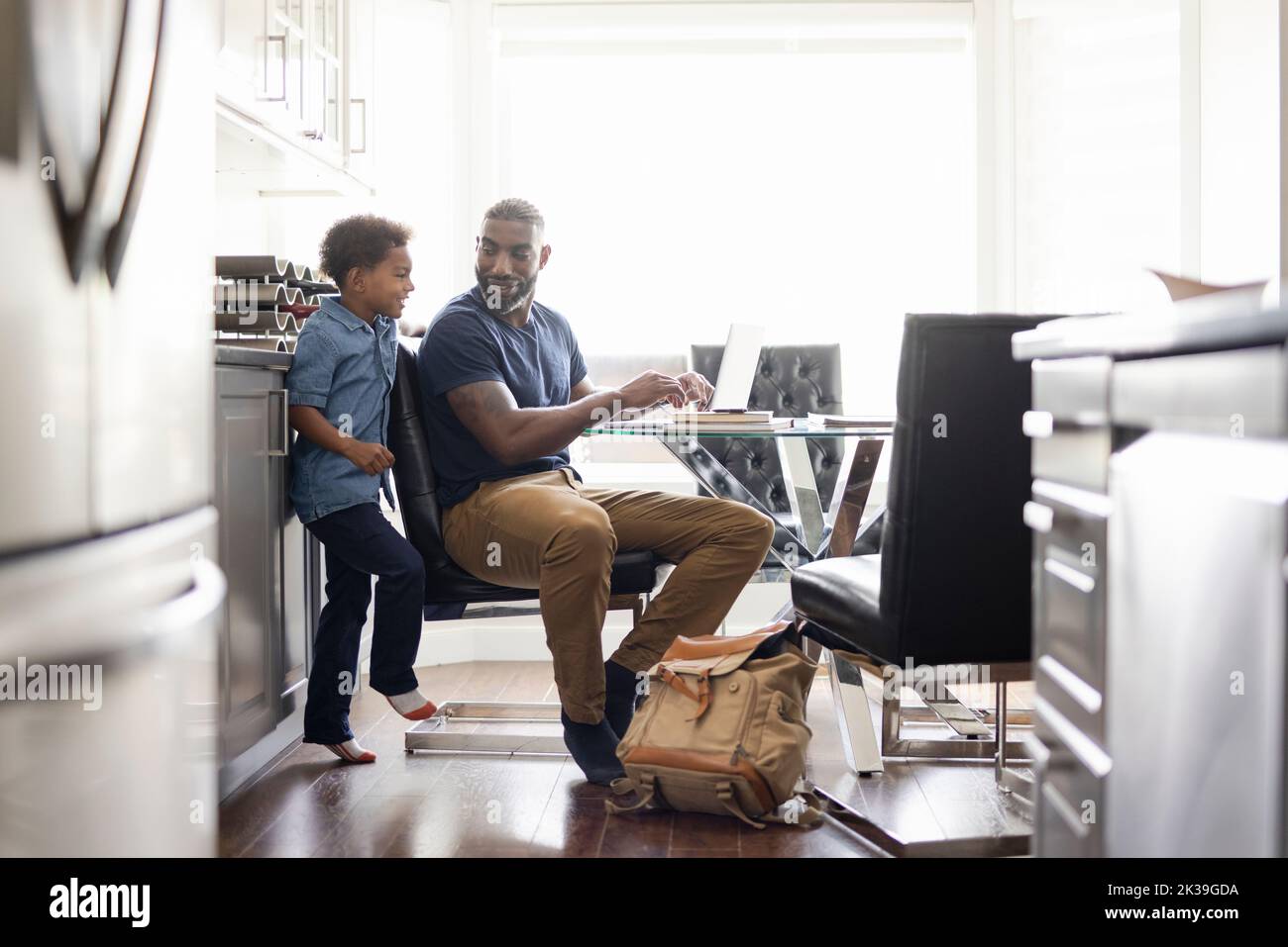 Work at dining table hi-res stock photography and images - Alamy