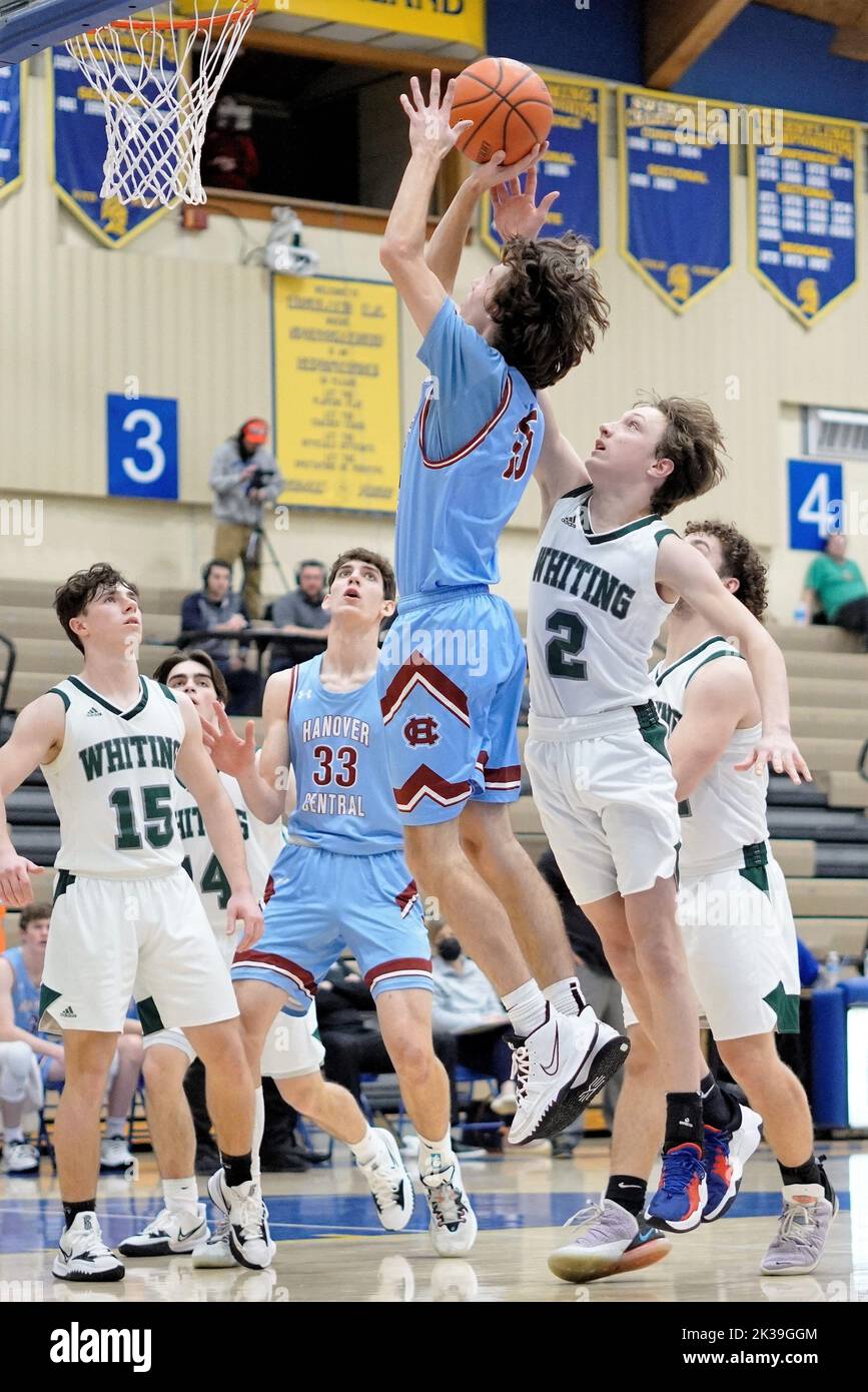 A vertical shot of basketball players from Hanover Central and Whiting ...
