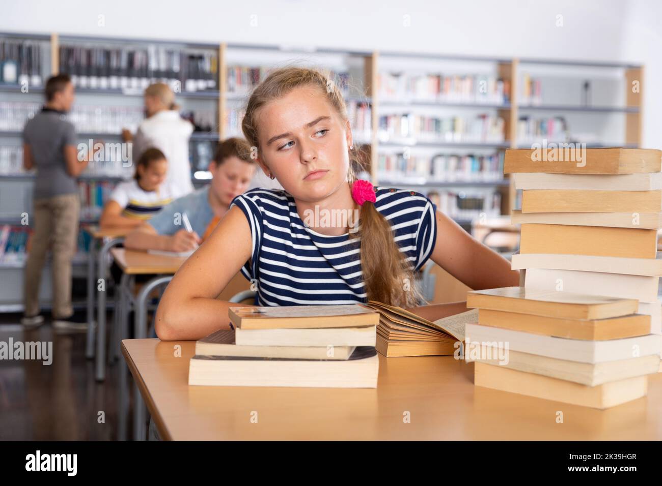 Bored teenage girl in library Stock Photo - Alamy Bored teenage girl in library Stock Photo - Alamy