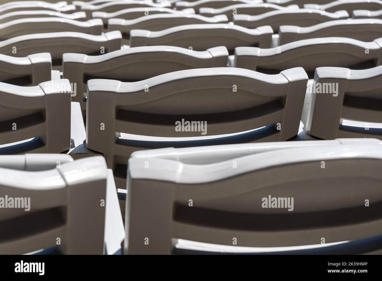 Rows of grey stadium seats, in selective focus, useful for backgrounds ...