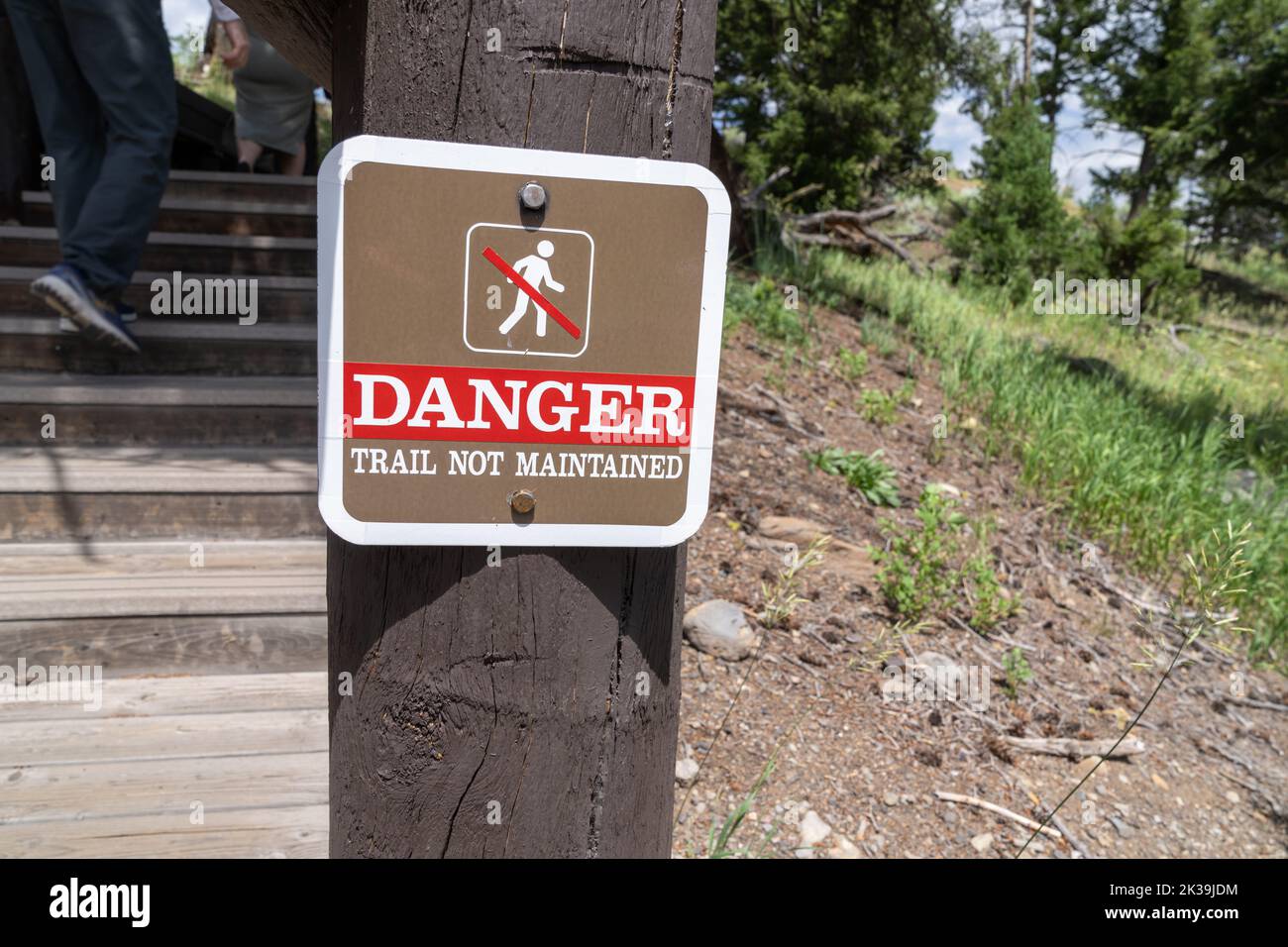 Warning sign - danger, trail not maintained. Taken in Yellowstone ...