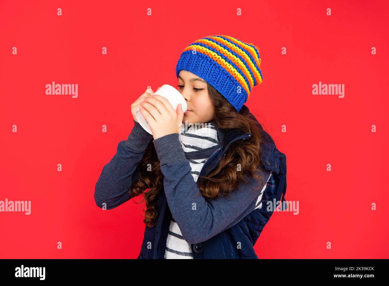 portrait of child with coffee cup. drinking cocoa and milk. kid in ...