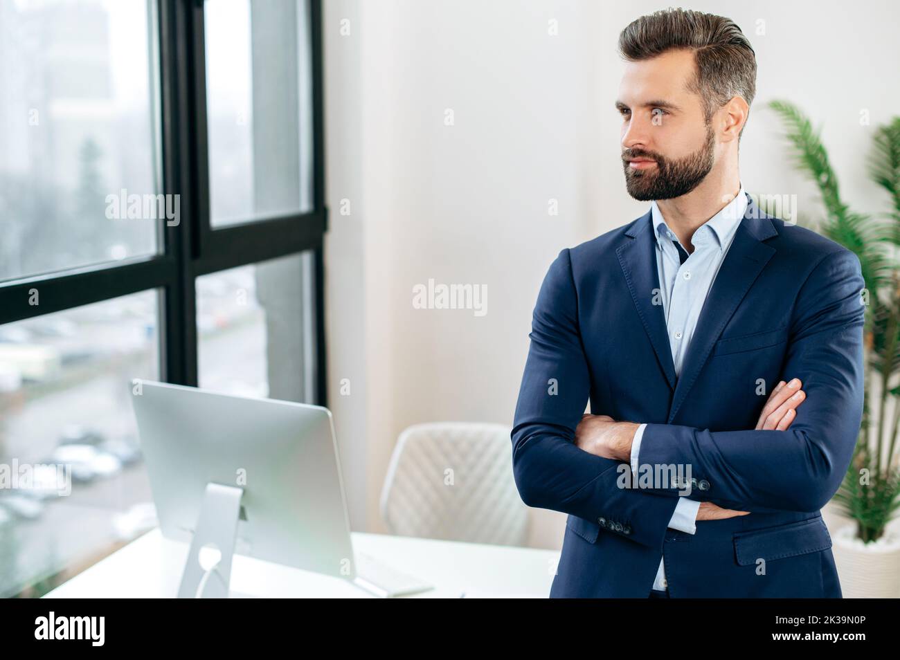Photo of a confident elegant successful caucasian bearded businessman ...