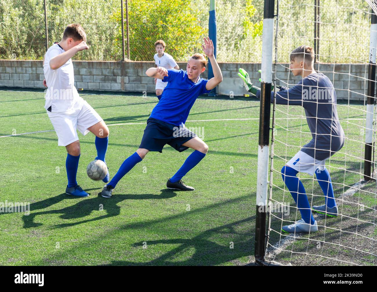 Football game - sharp moments in scoring area Stock Photo - Alamy