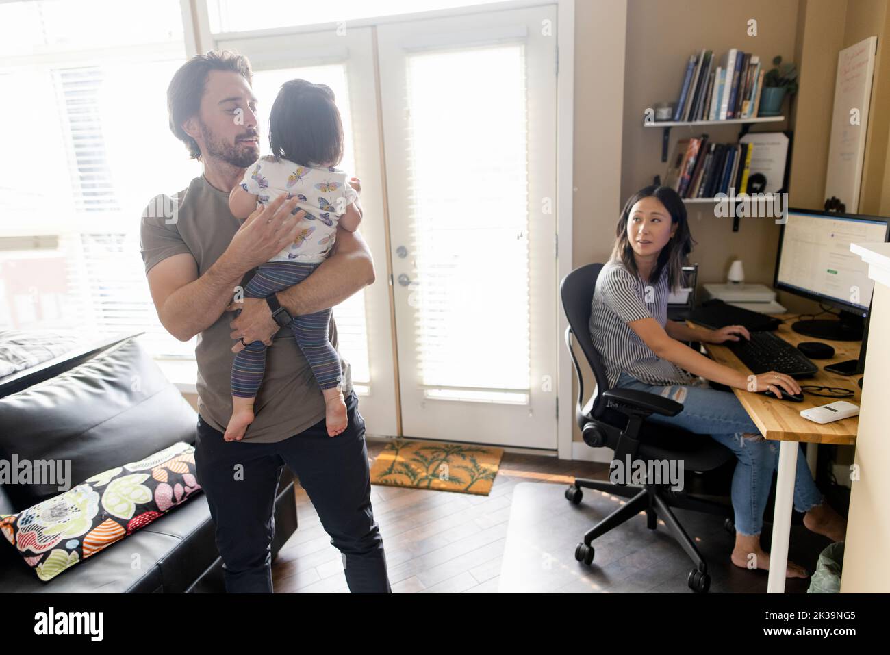 Man woman couple watching girl daughter hi-res stock photography and images - Alamy