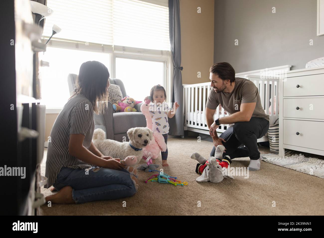 Asian parents watching hi-res stock photography and images - Alamy