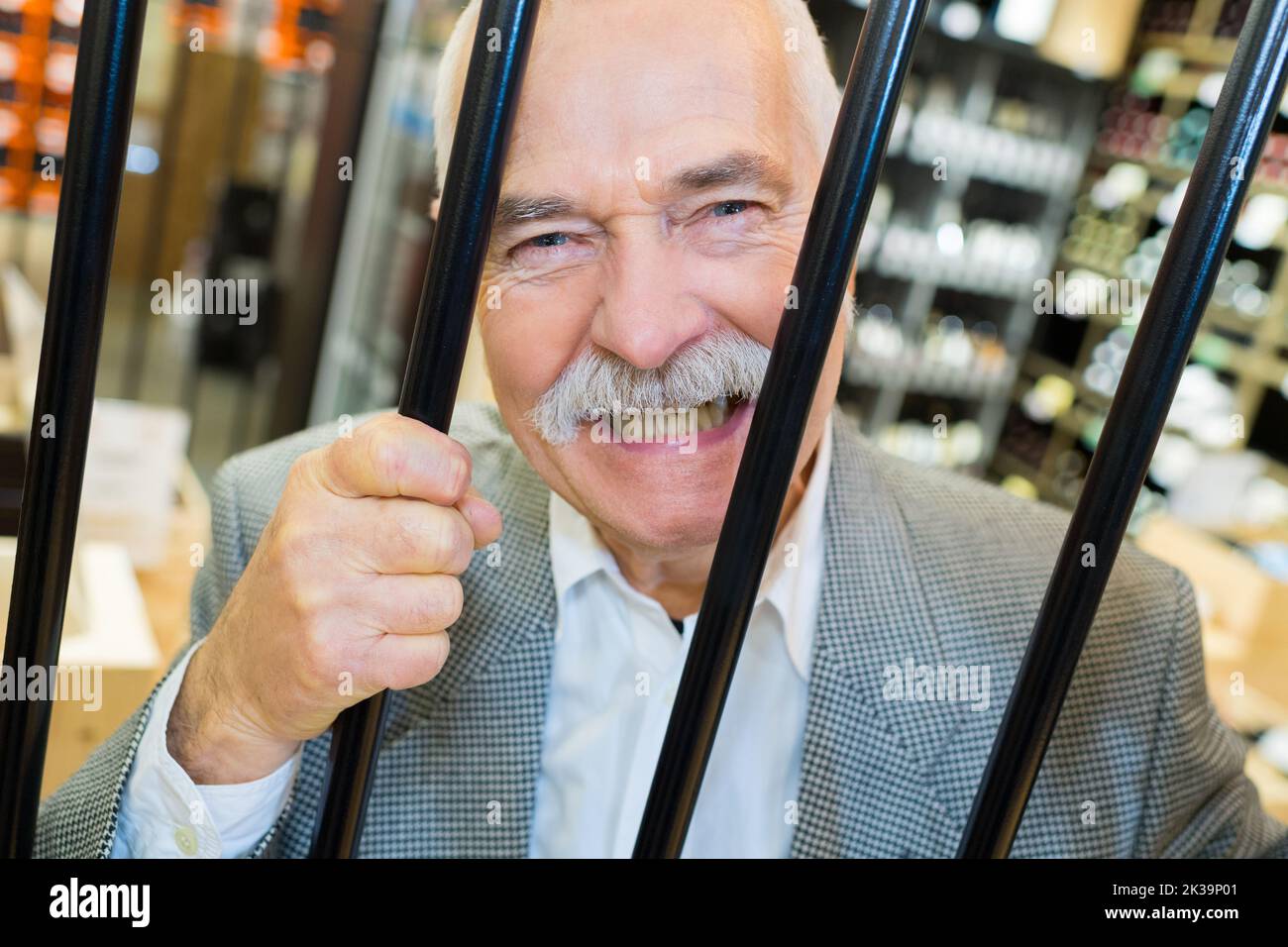 man trapped in prison concept Stock Photo - Alamy