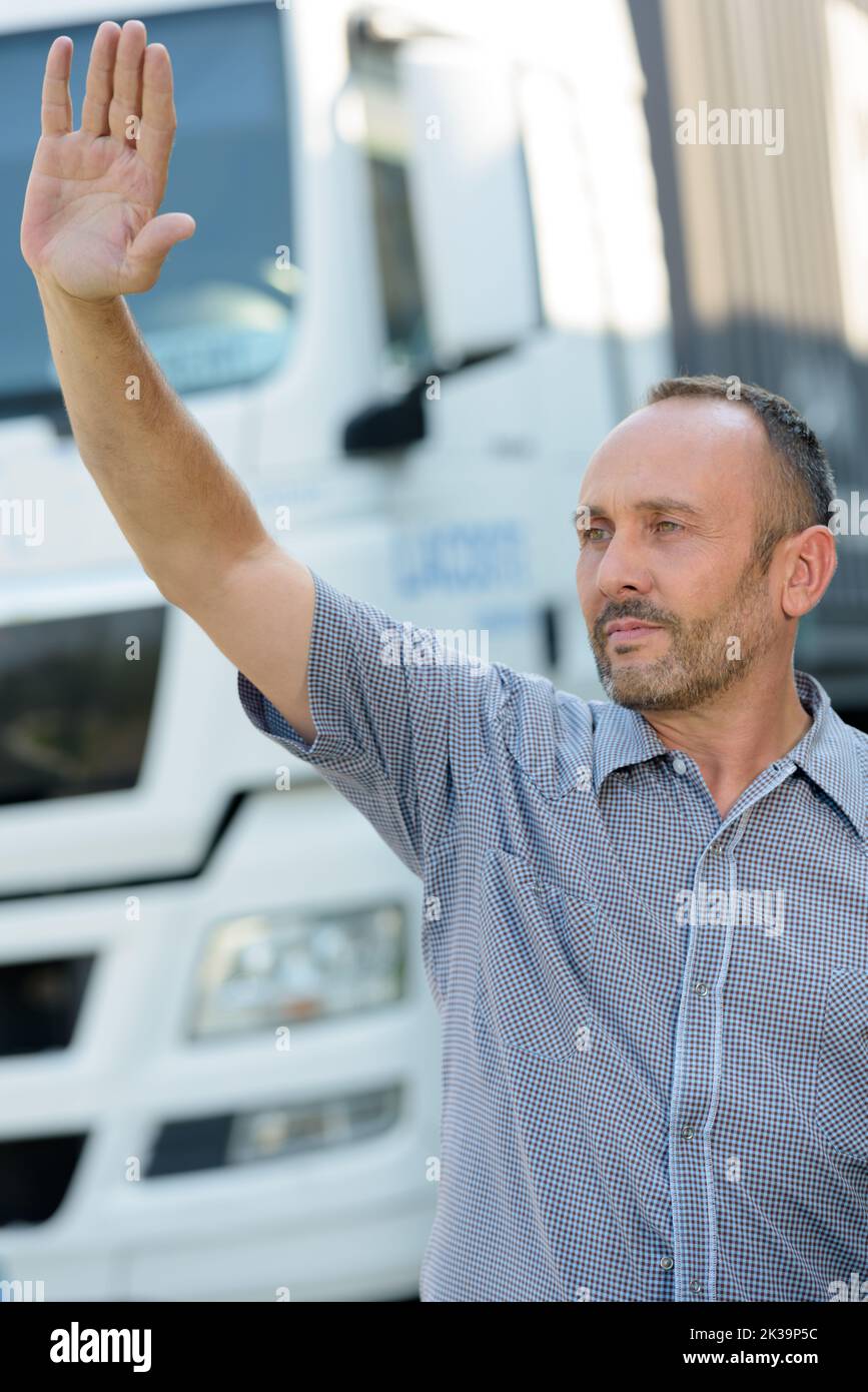 happy driver in front of container trailer or vehicles Stock Photo - Alamy