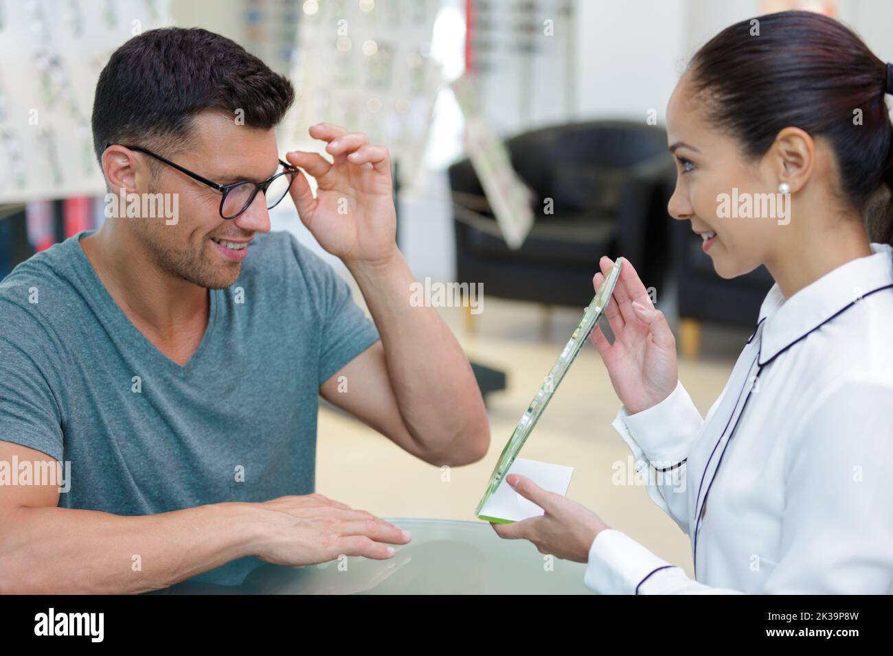 optical store people and lenses Stock Photo - Alamy