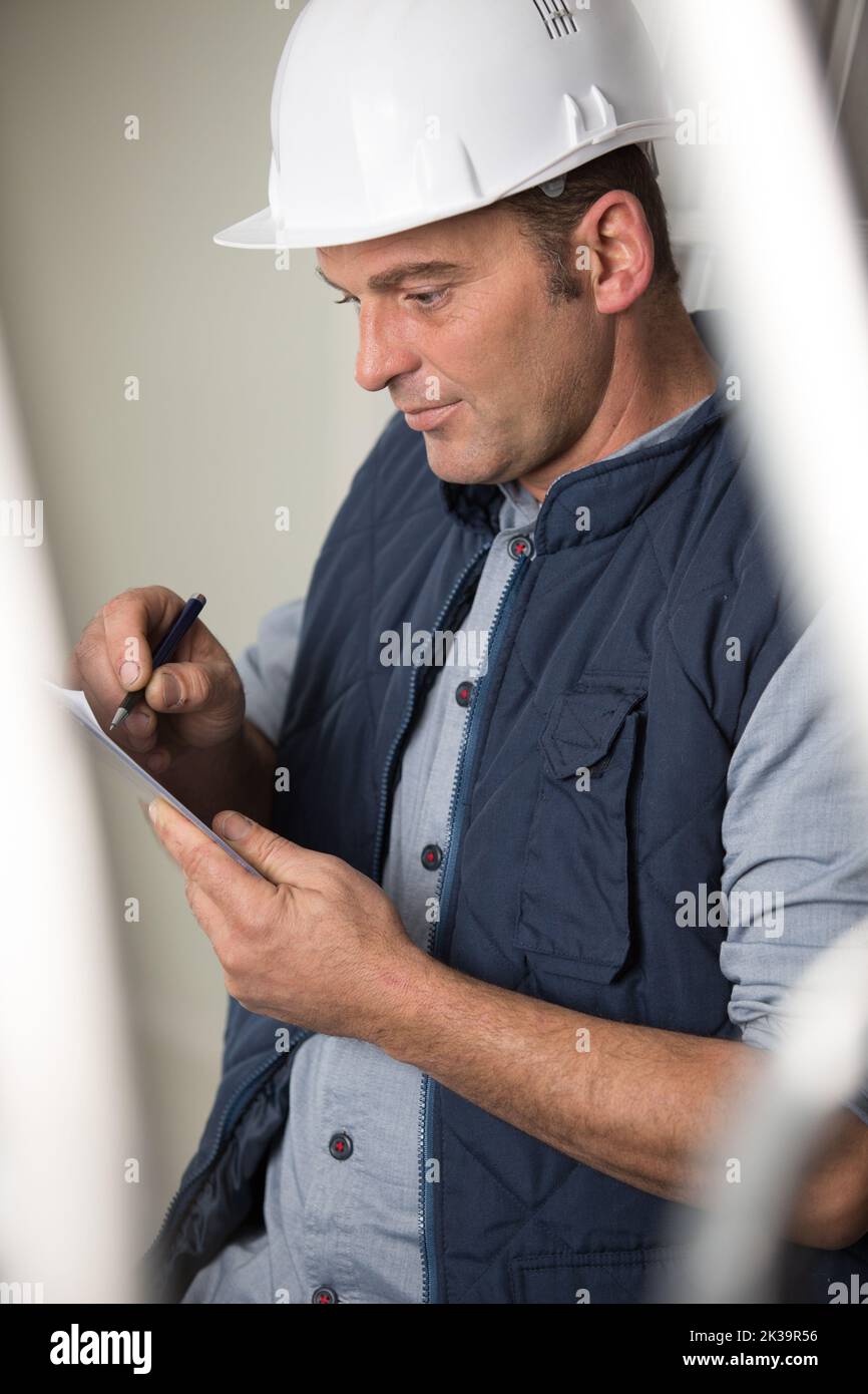Man builder records something hi-res stock photography and images - Alamy