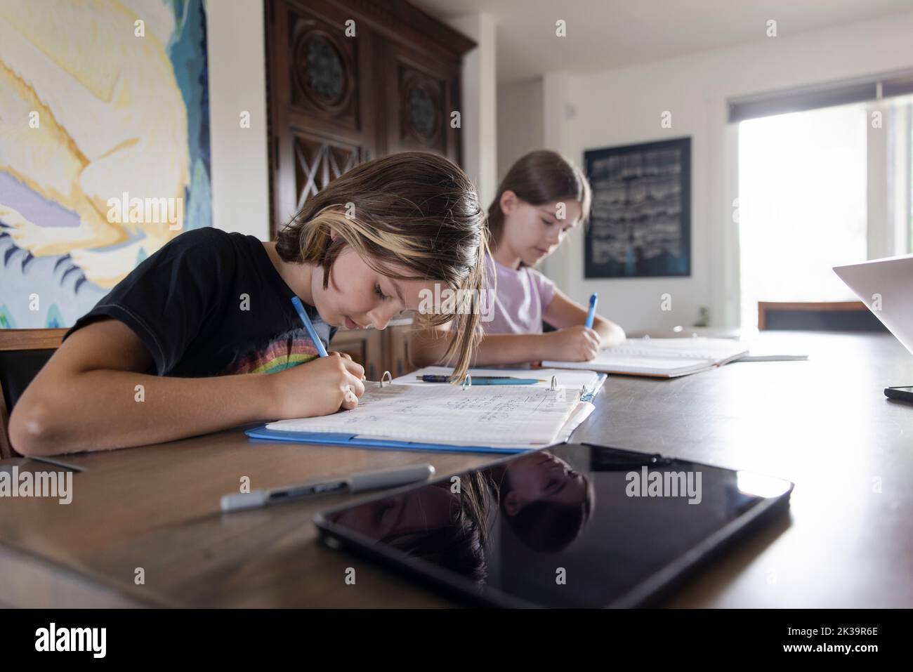 Boy girl child writing home preteen hi-res stock photography and images ...