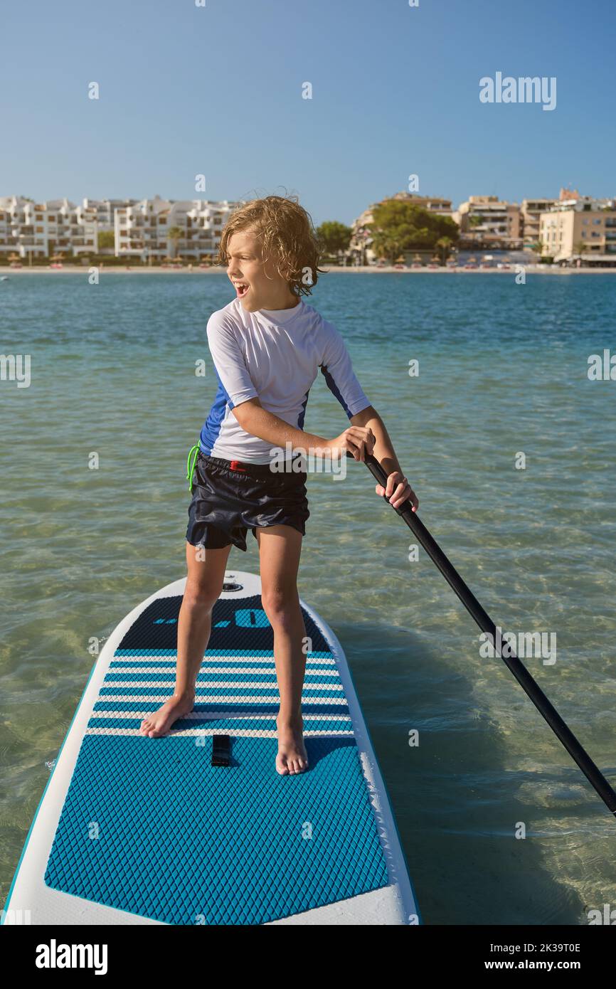 Child learning to paddle hi-res stock photography and images - Alamy